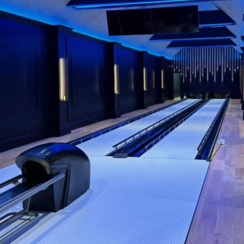 Bowling Ball Return Systems: Throughput, Safety, and Noise Control